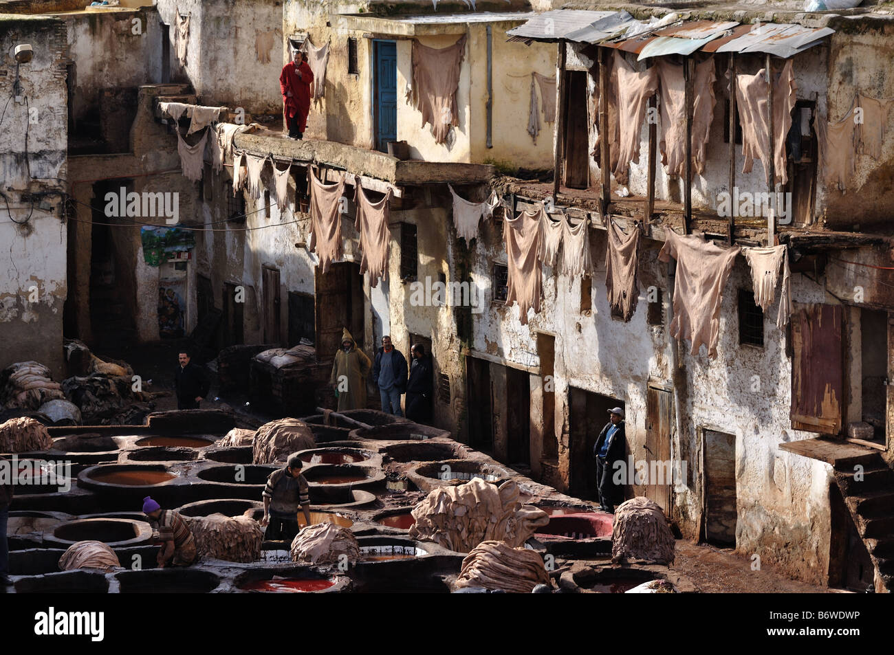 Leather tanning in the traditional tannery Chouwara in Fes, Morocco ...