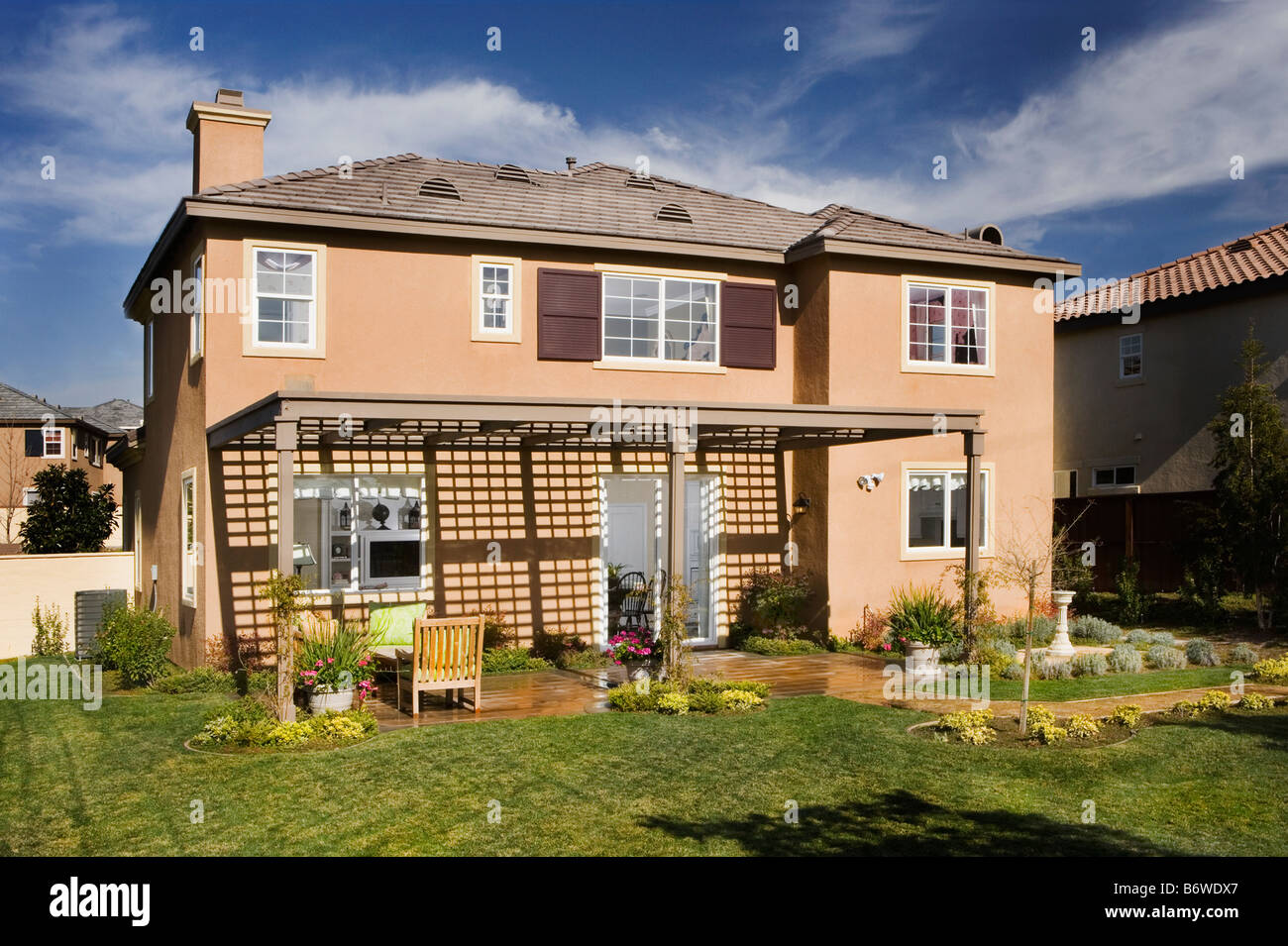 Rear exterior multiple story home Stock Photo - Alamy