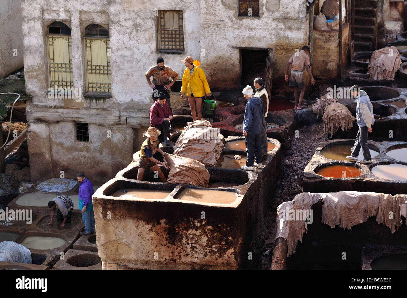 Leather tanning in the traditional tannery Chouwara in Fes, Morocco ...