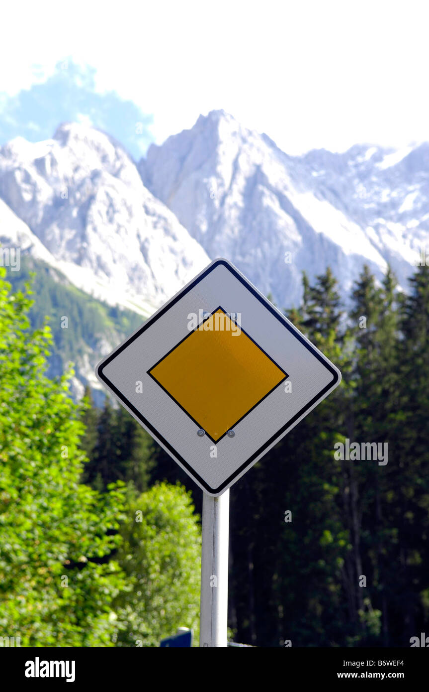 yellow diamond right of way road sign bavaria germany deutschland alps ...