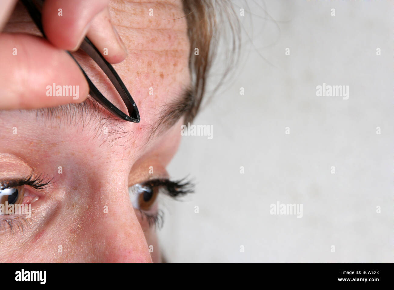 Nose hair plucking hi-res stock photography and images - Alamy