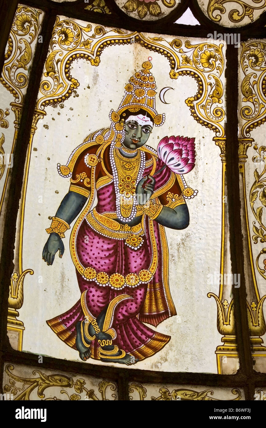 A Hindu mythological figure is painted onto a pane in the glass roof of ...