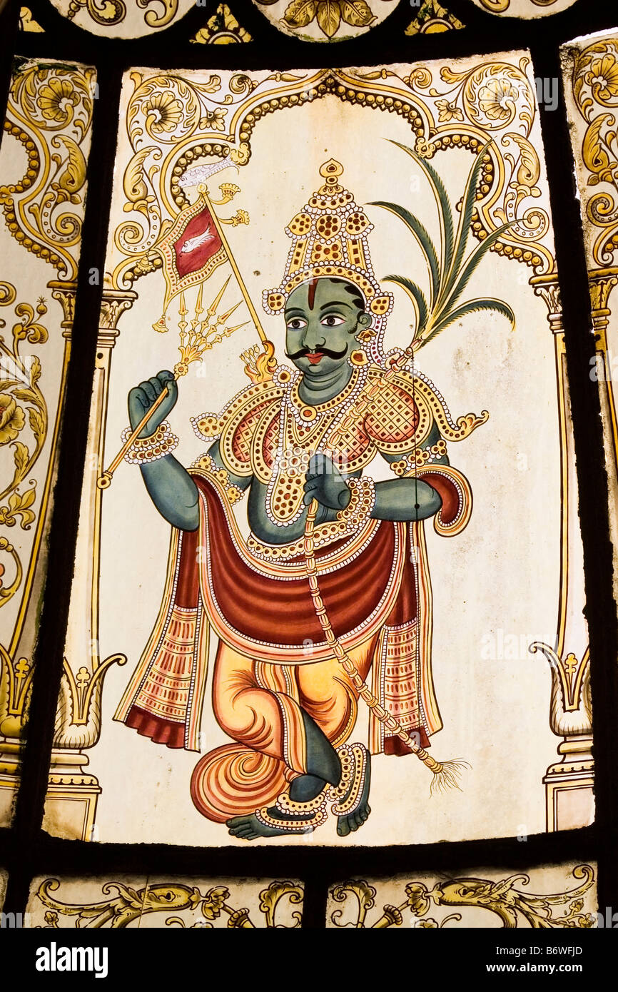A Hindu mythological figure is painted onto a pane in the glass roof of ...