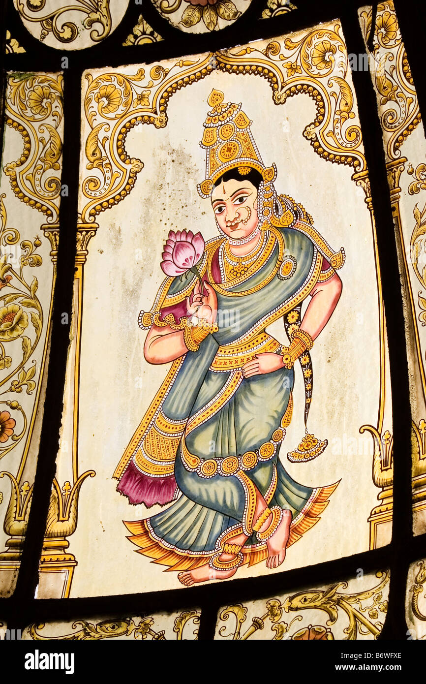 A Hindu mythological figure is painted onto a pane in the glass roof of ...