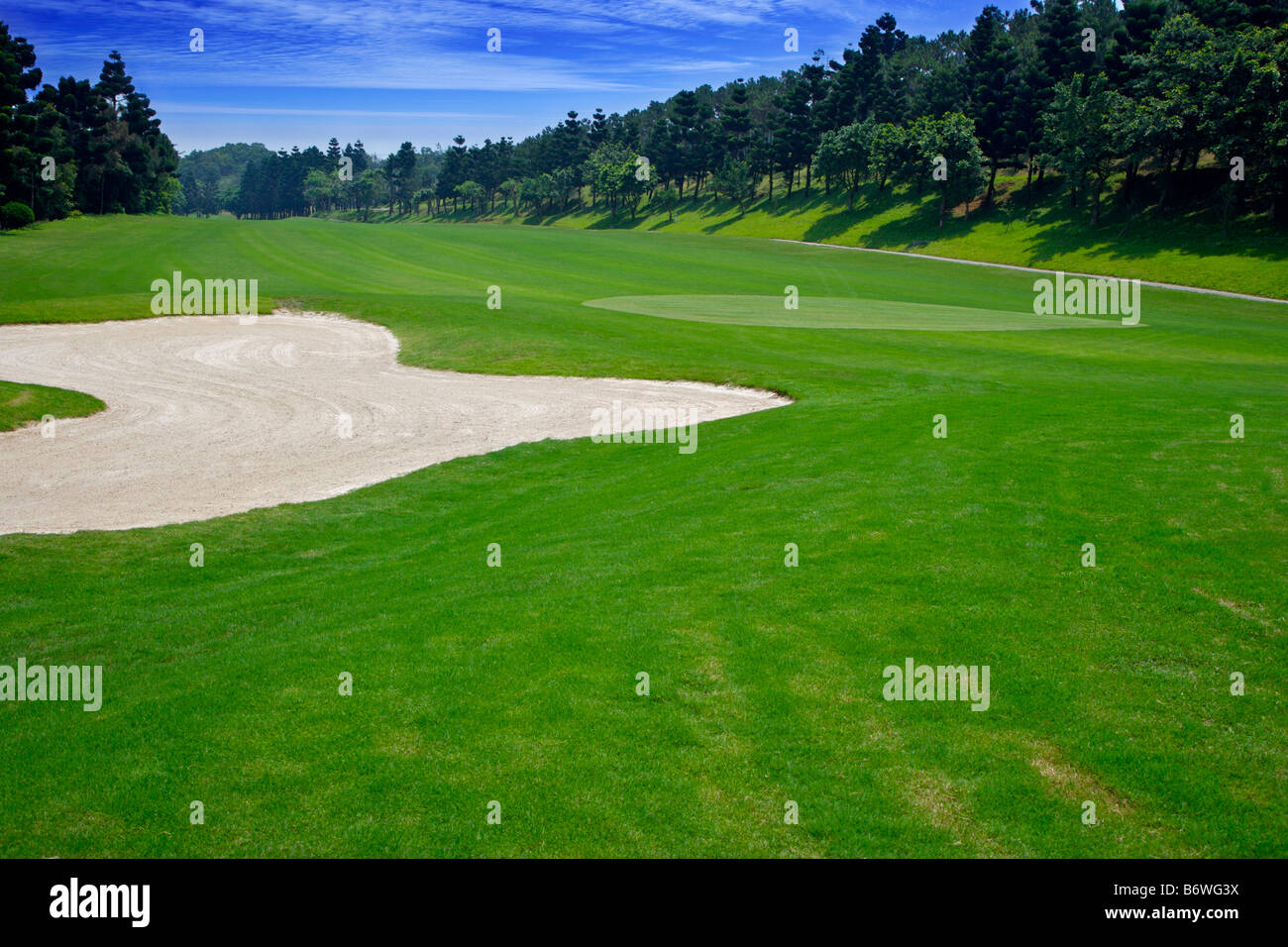 Sand trap in golf course Stock Photo - Alamy