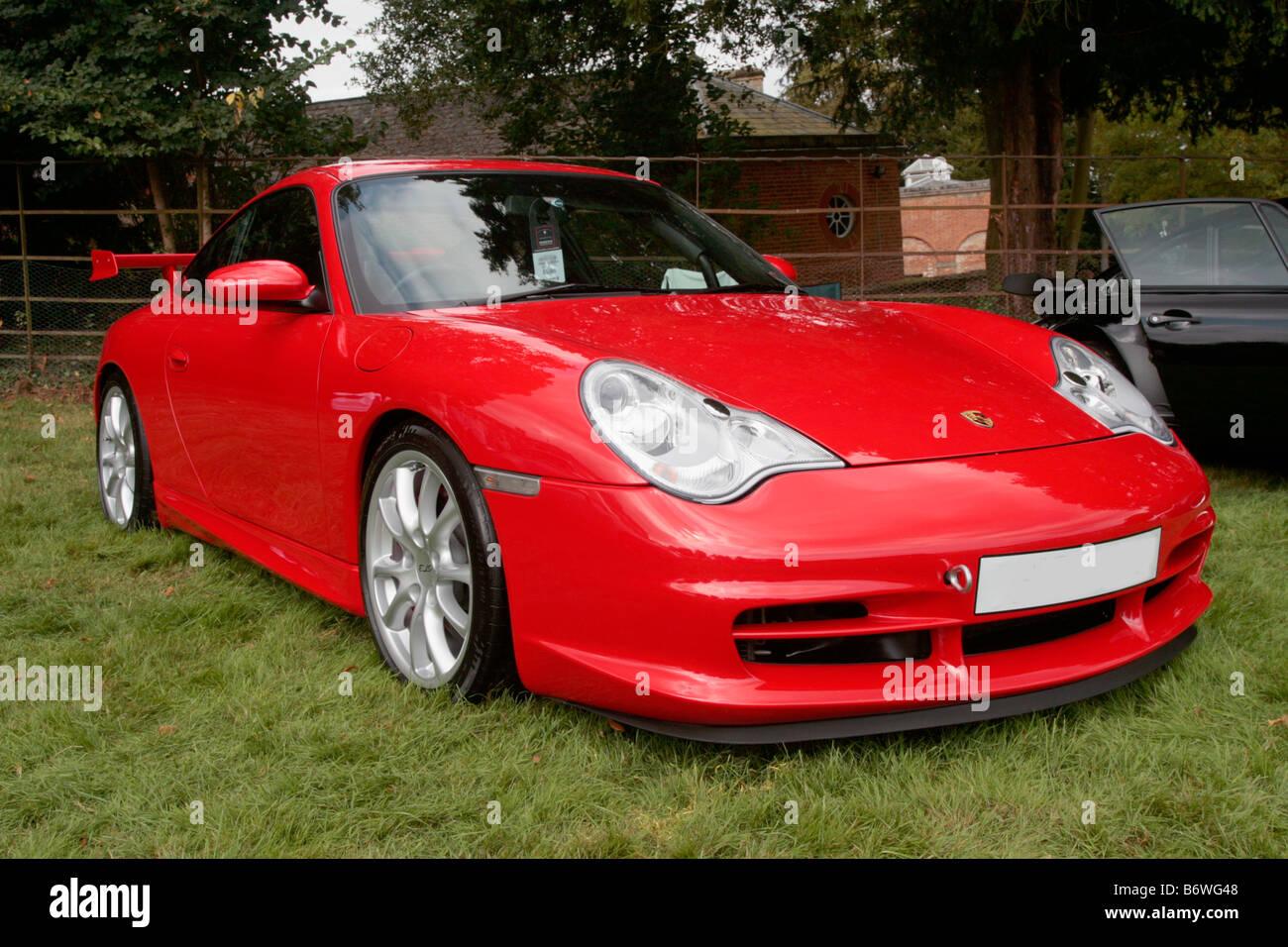 Bright Red Porsche Sports Car Stock Photo - Alamy