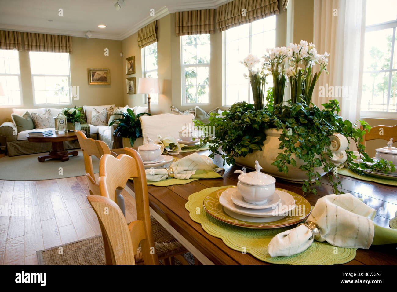Traditional place settings on wooden dining table Stock Photo - Alamy