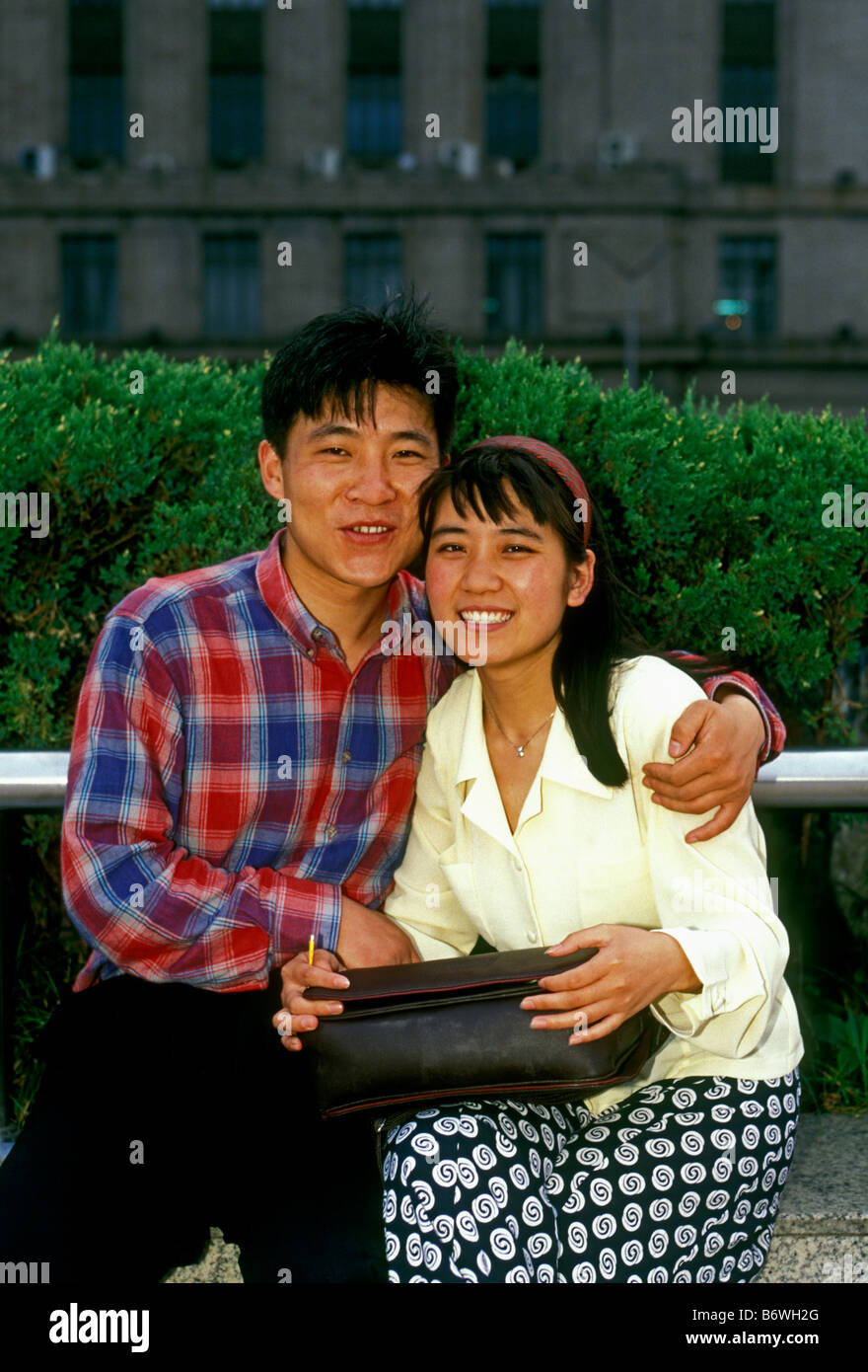 Chinese man, Chinese woman, man, woman, couple, eye contact, front view ...