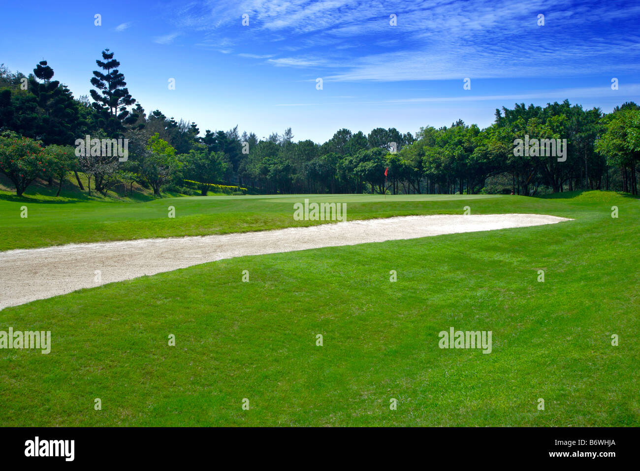 Golf course with green and sand traps Stock Photo - Alamy