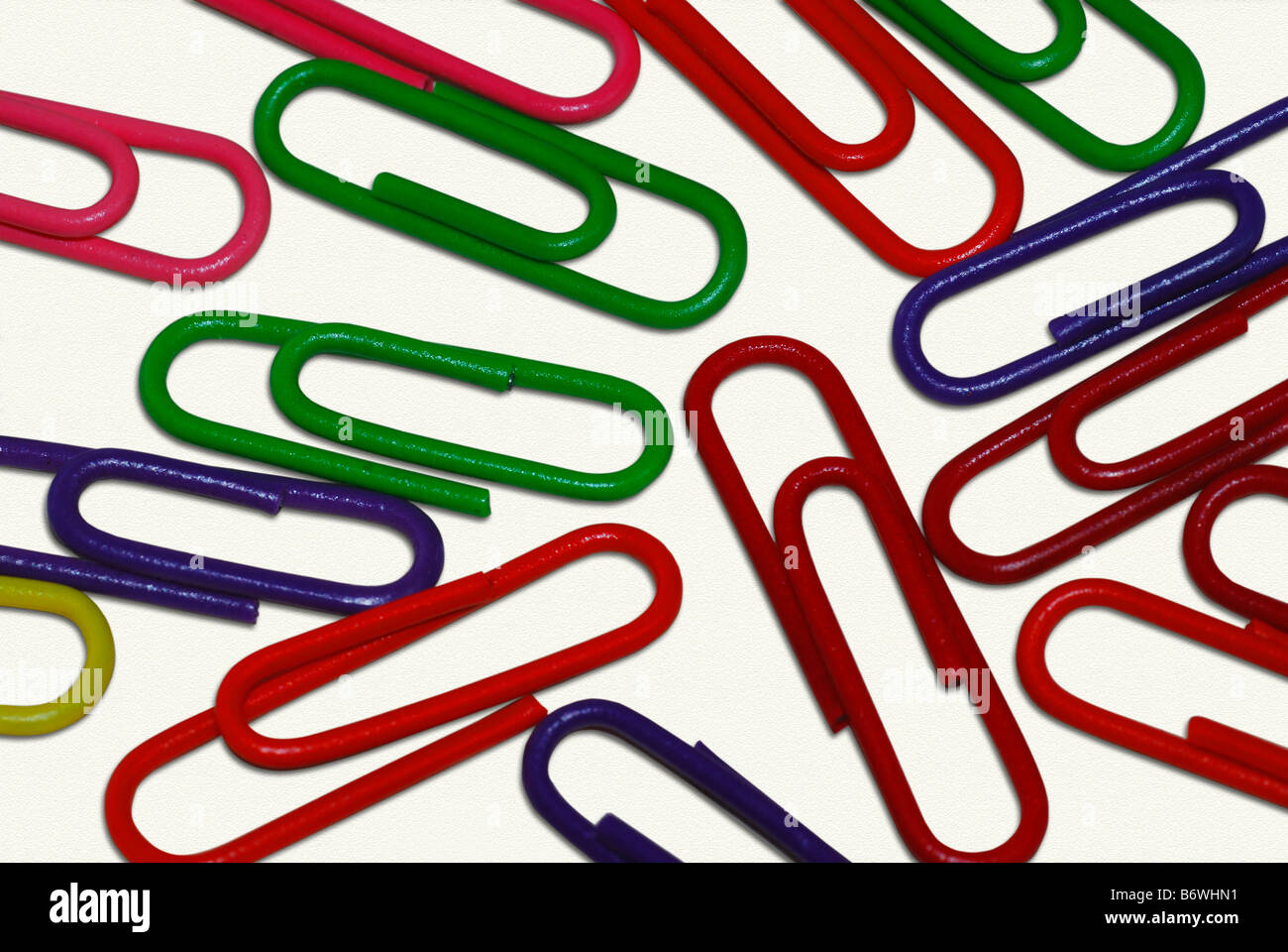 Colorful U clips placed on paper Stock Photo - Alamy