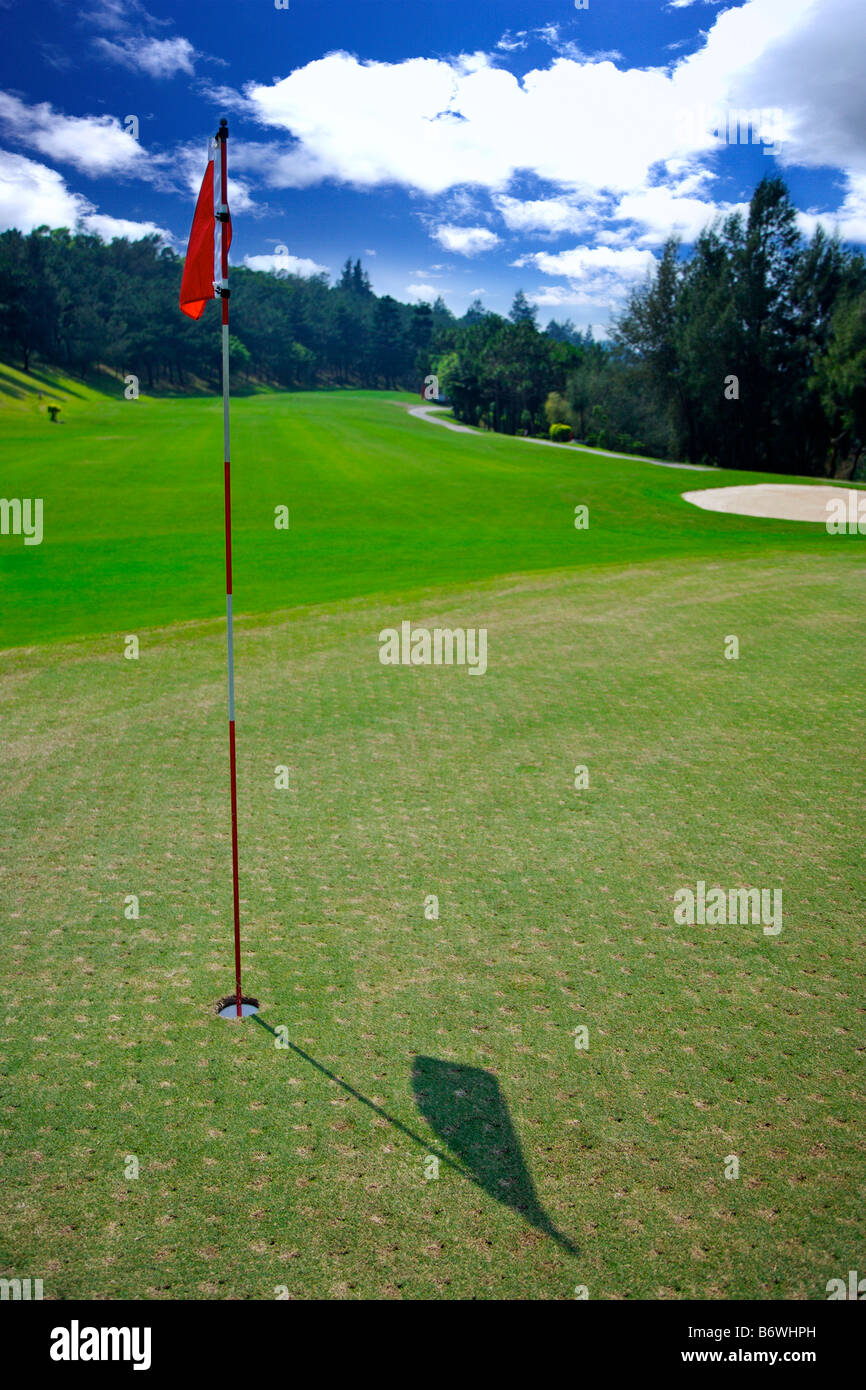 Flag in golf course Stock Photo - Alamy