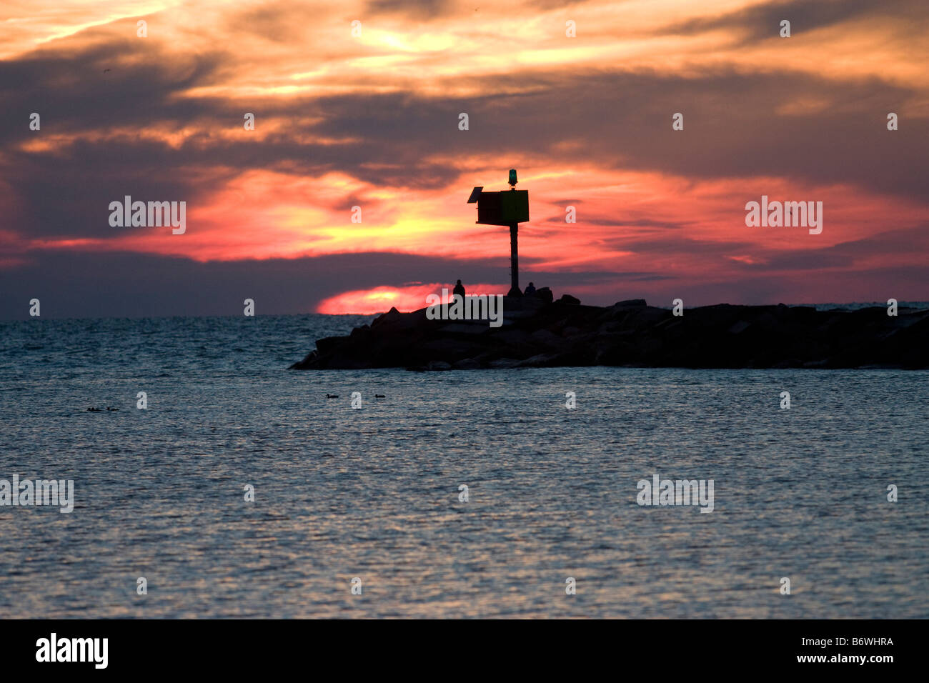 Marine navigational beacon at the entrance of the New Buffalo harbor in ...