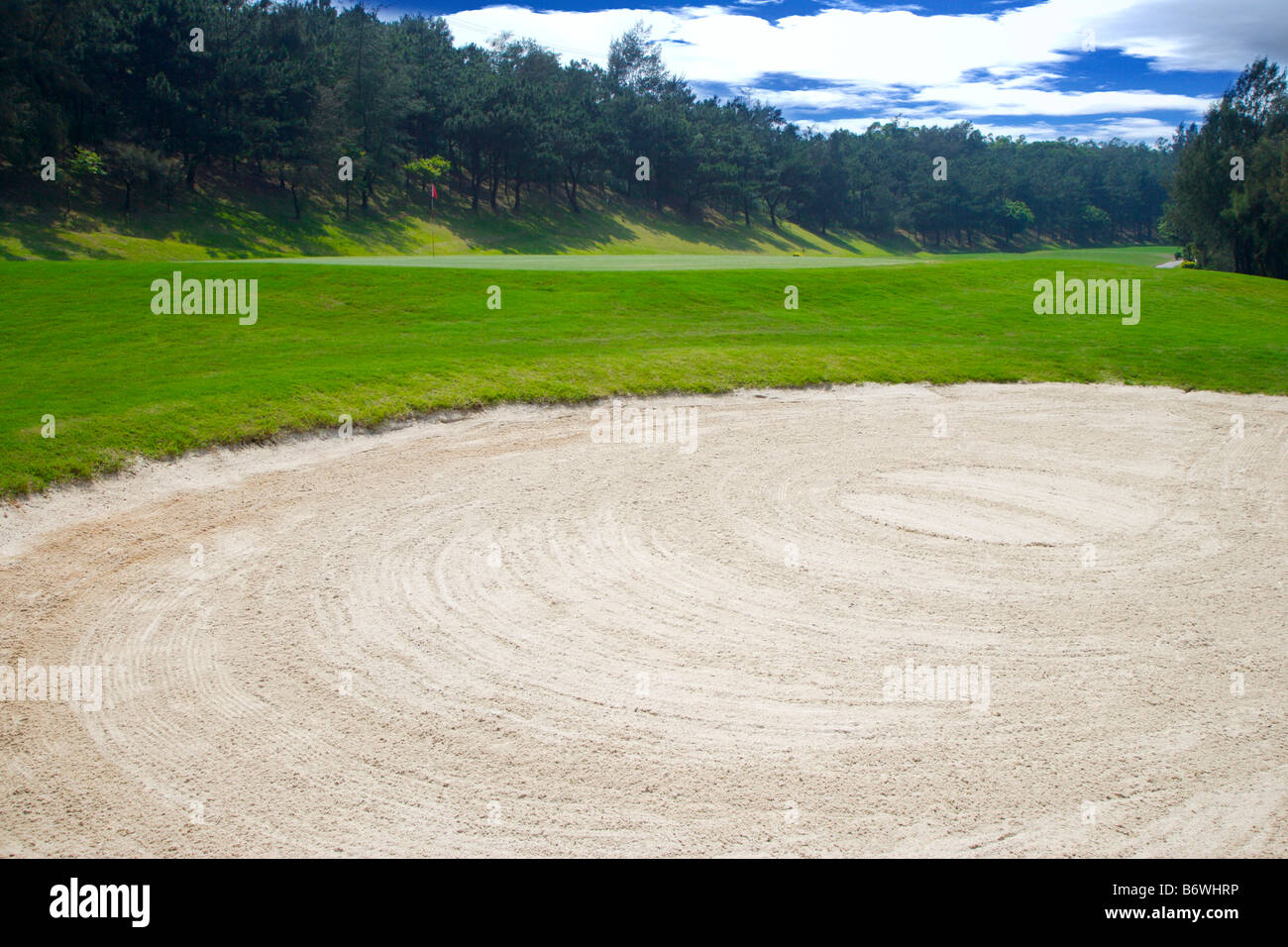 Golf course with sand traps Stock Photo - Alamy