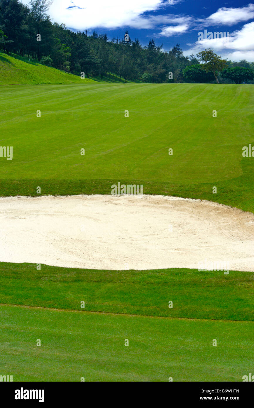 Sand trap in golf course Stock Photo - Alamy