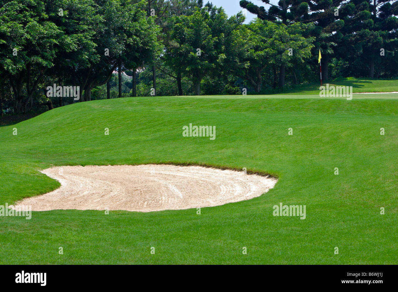 Sand trap in golf course Stock Photo - Alamy