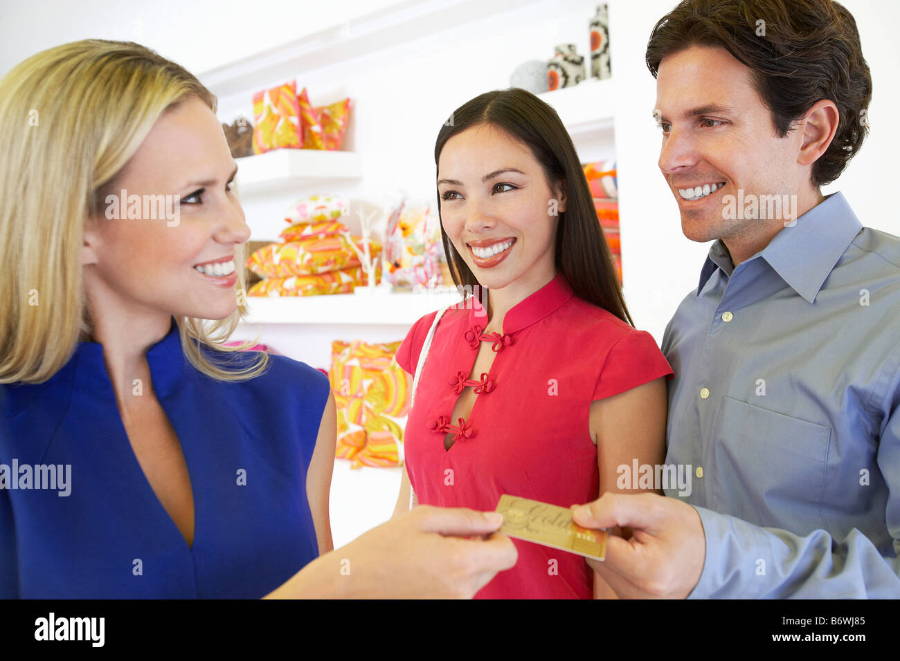 Couple Making a Purchase Stock Photo - Alamy