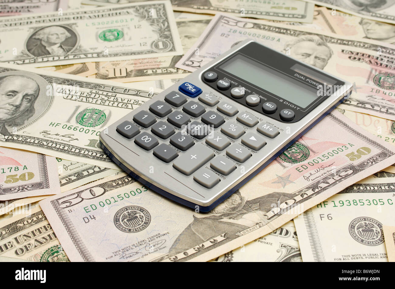 Money and Calculator Stock Photo - Alamy