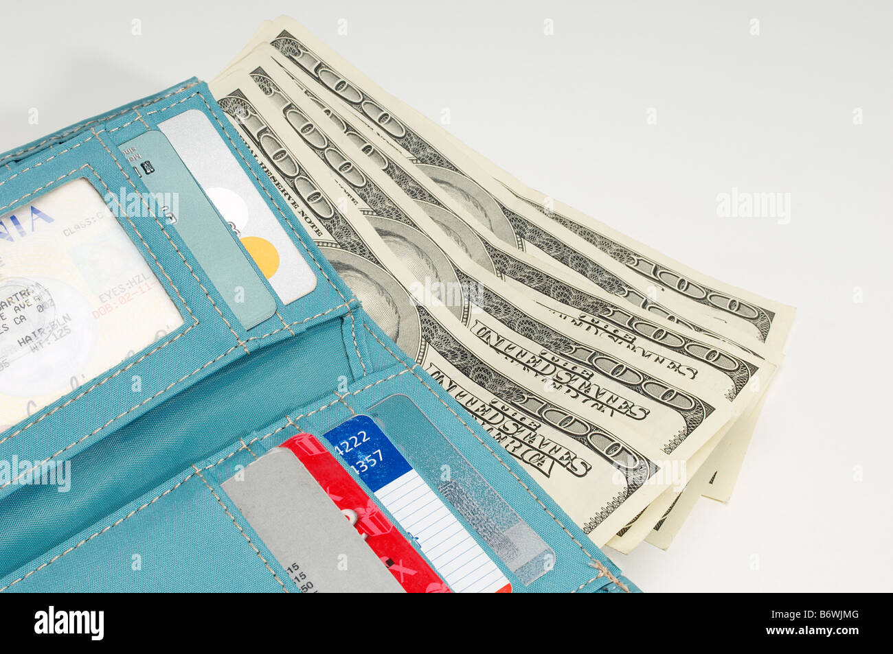 Wallet Full of Money Stock Photo - Alamy