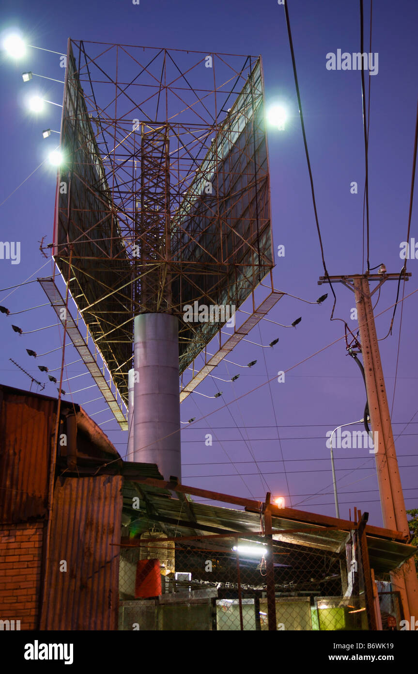 Double Billboards Above Fenced Storage Enclosure Stock Photo - Alamy