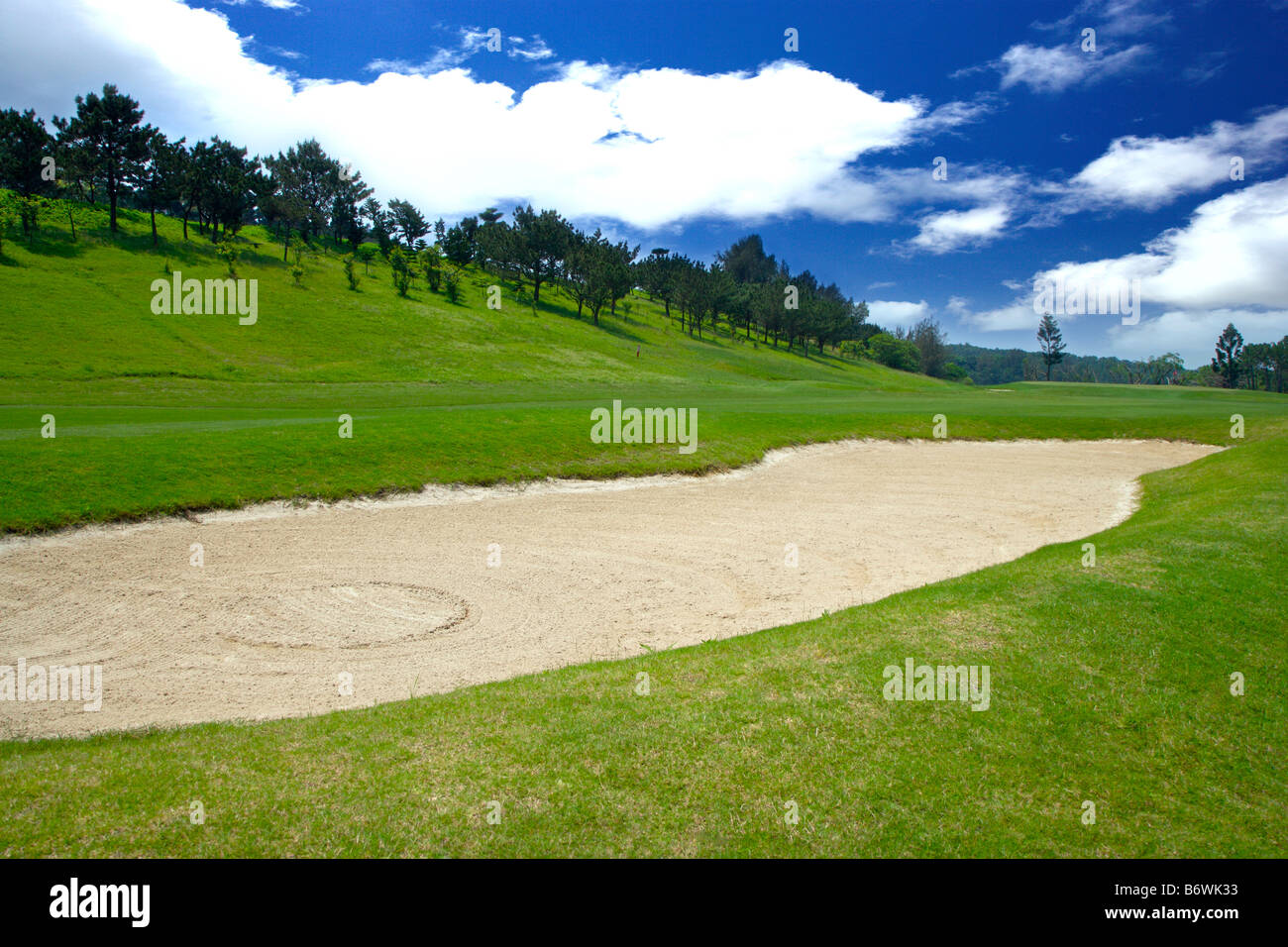 Sand trap in golf course Stock Photo - Alamy