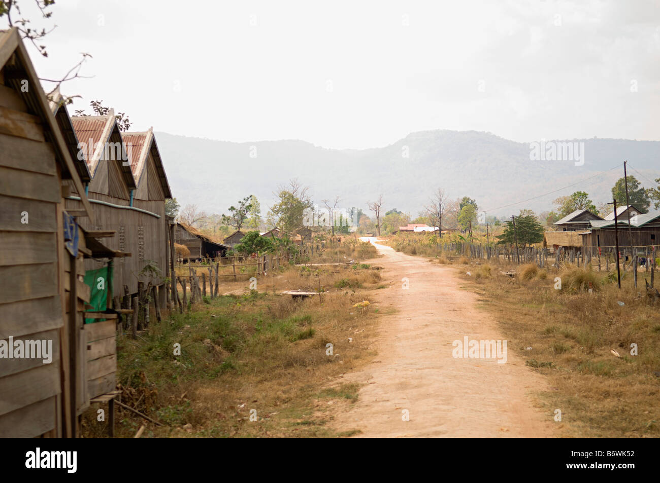 Dirt Road in Village Stock Photo - Alamy