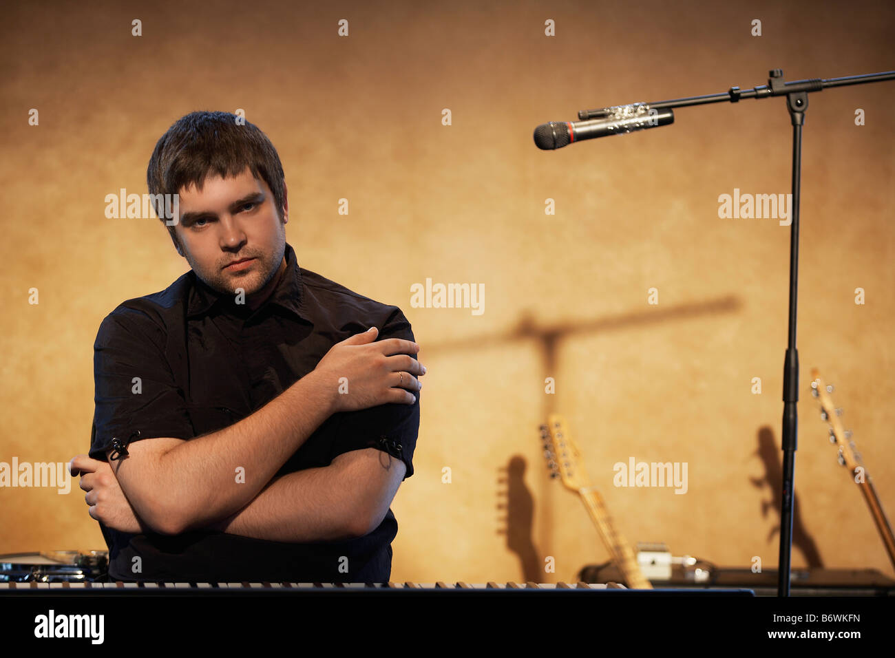 Musician by Microphone and Keyboard Stock Photo - Alamy