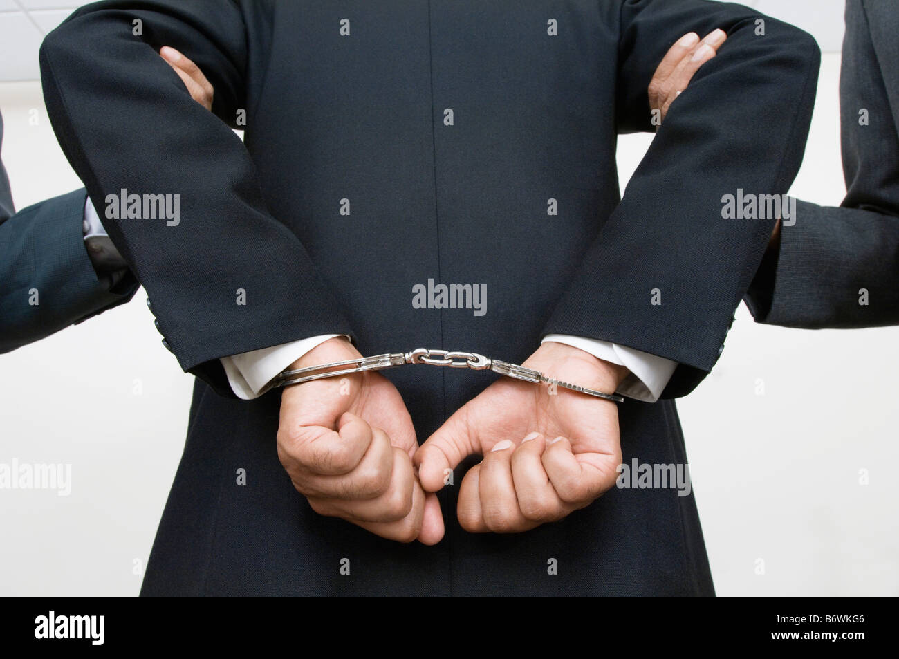 Businessman Being Arrested Stock Photo - Alamy