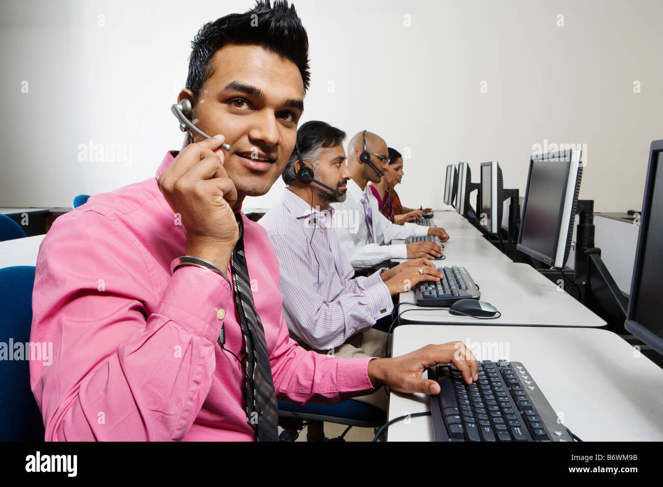 Customer Service Rep in Call Center Stock Photo - Alamy