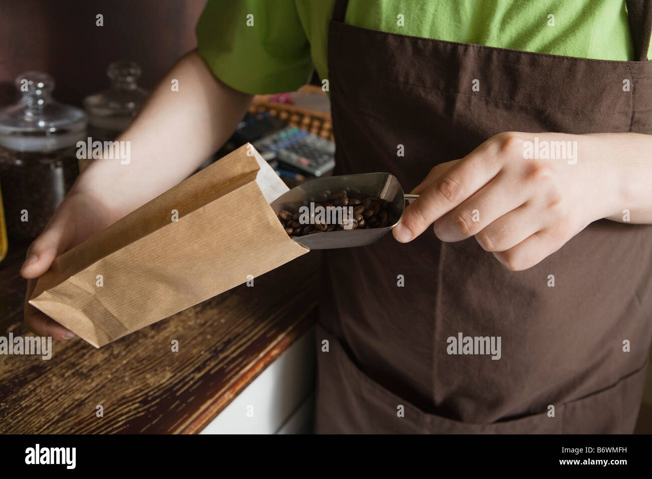 Scooping paper hi-res stock photography and images - Alamy