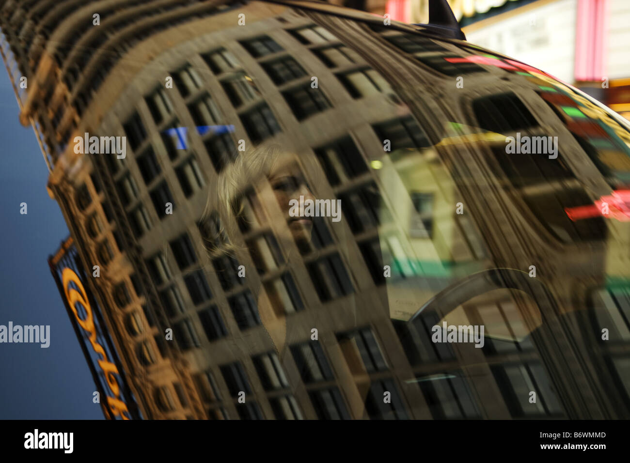 Reflection of downtown building on car windscreen Stock Photo - Alamy