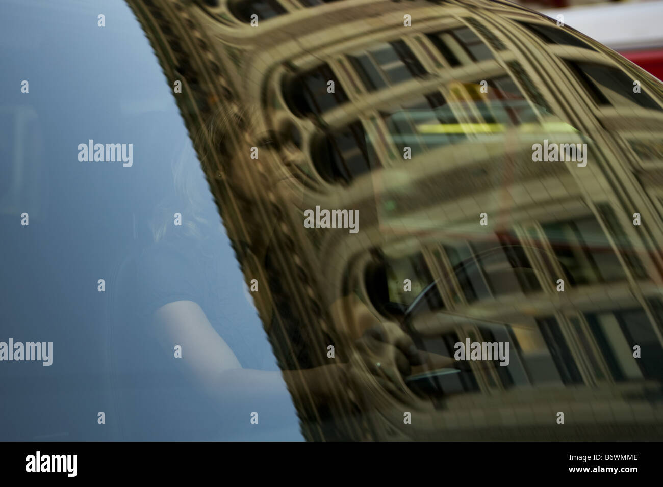 Reflection of downtown building on car windscreen Stock Photo - Alamy