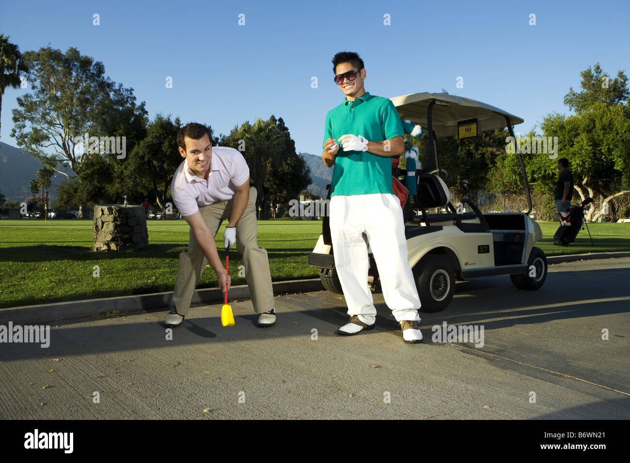 Golfers laughing hi-res stock photography and images - Alamy