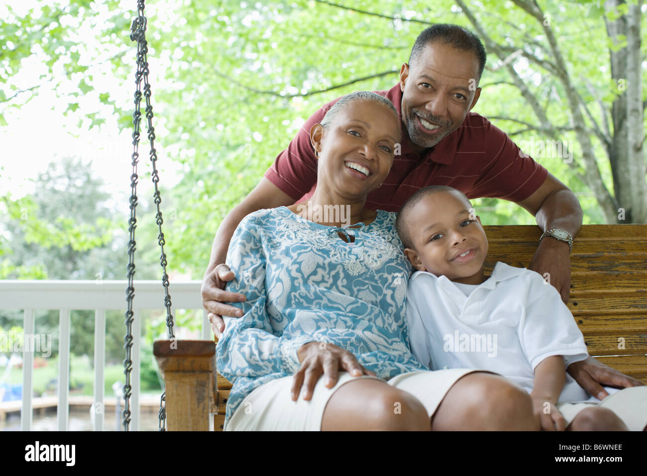 Portrait of grandparents with their grandson Stock Photo - Alamy