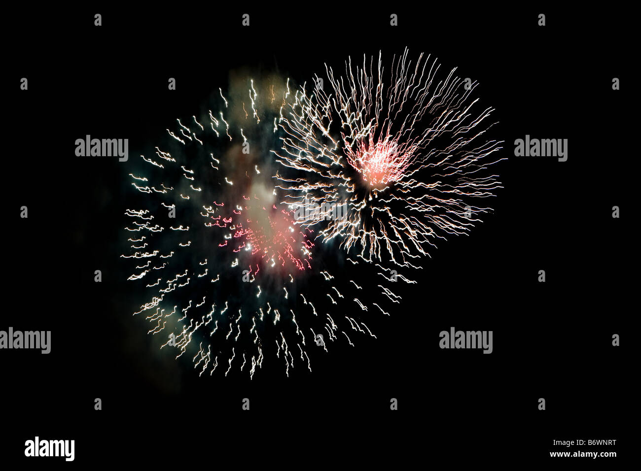 Red fireworks lighting up sky hi-res stock photography and images - Alamy