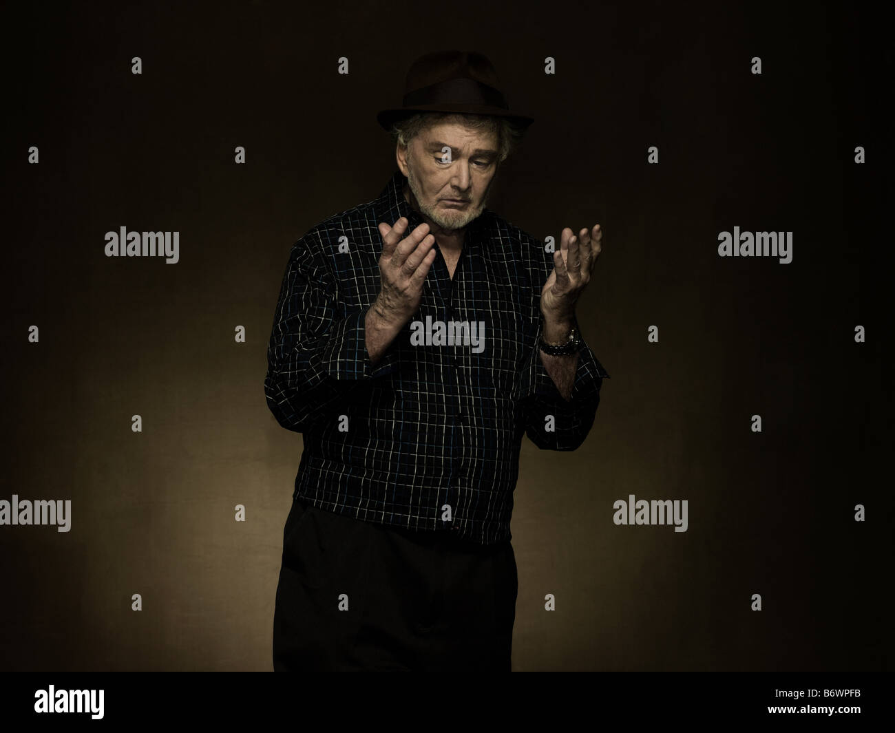 Senior man stands hi-res stock photography and images - Alamy