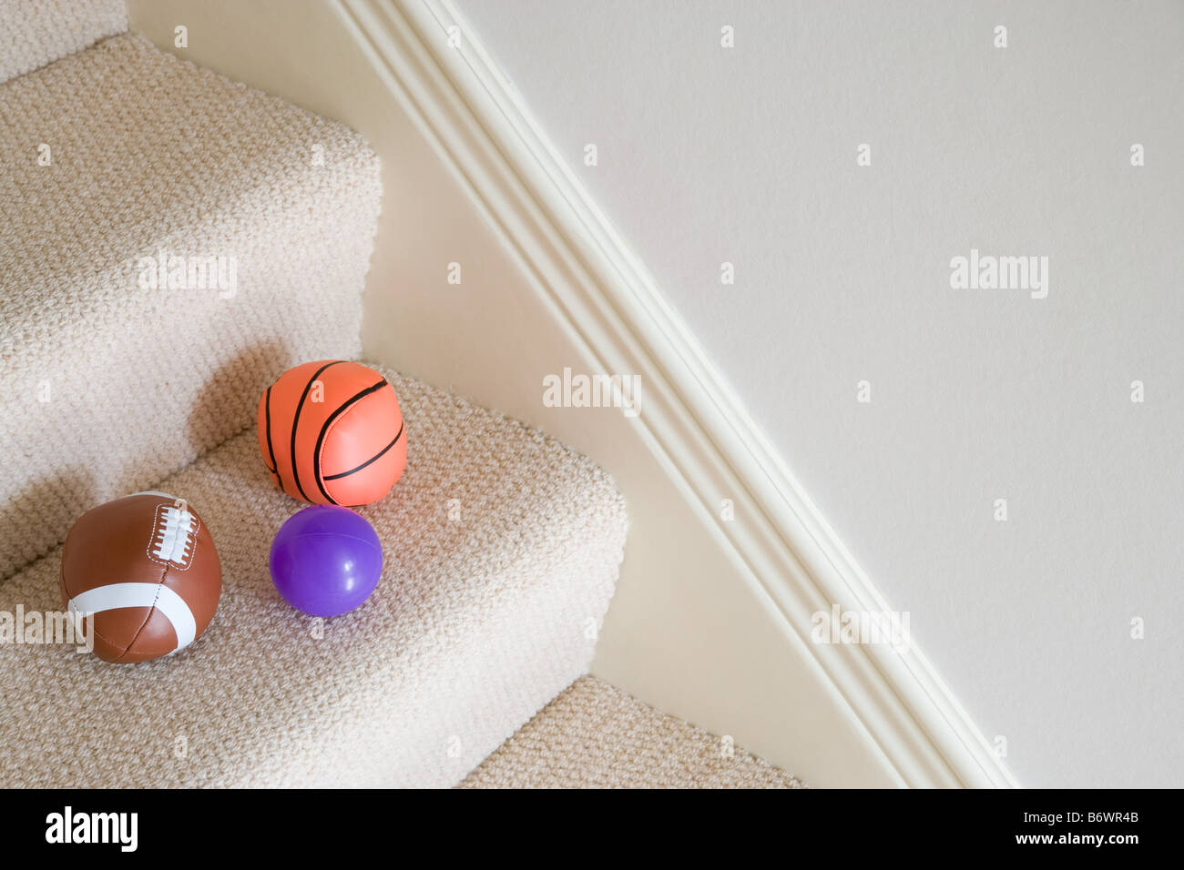 Balls on staircase Stock Photo - Alamy