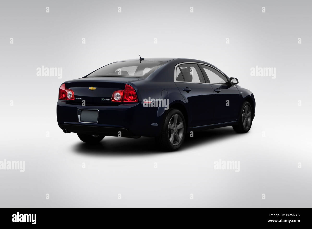 2009 Chevrolet Malibu Hybrid in Blue - Rear angle view Stock Photo - Alamy