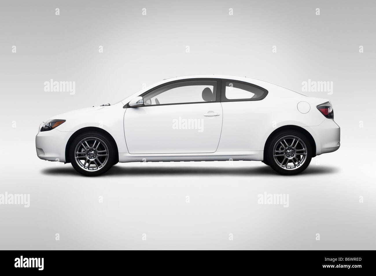 2009 Scion tC in White - Drivers Side Profile Stock Photo - Alamy