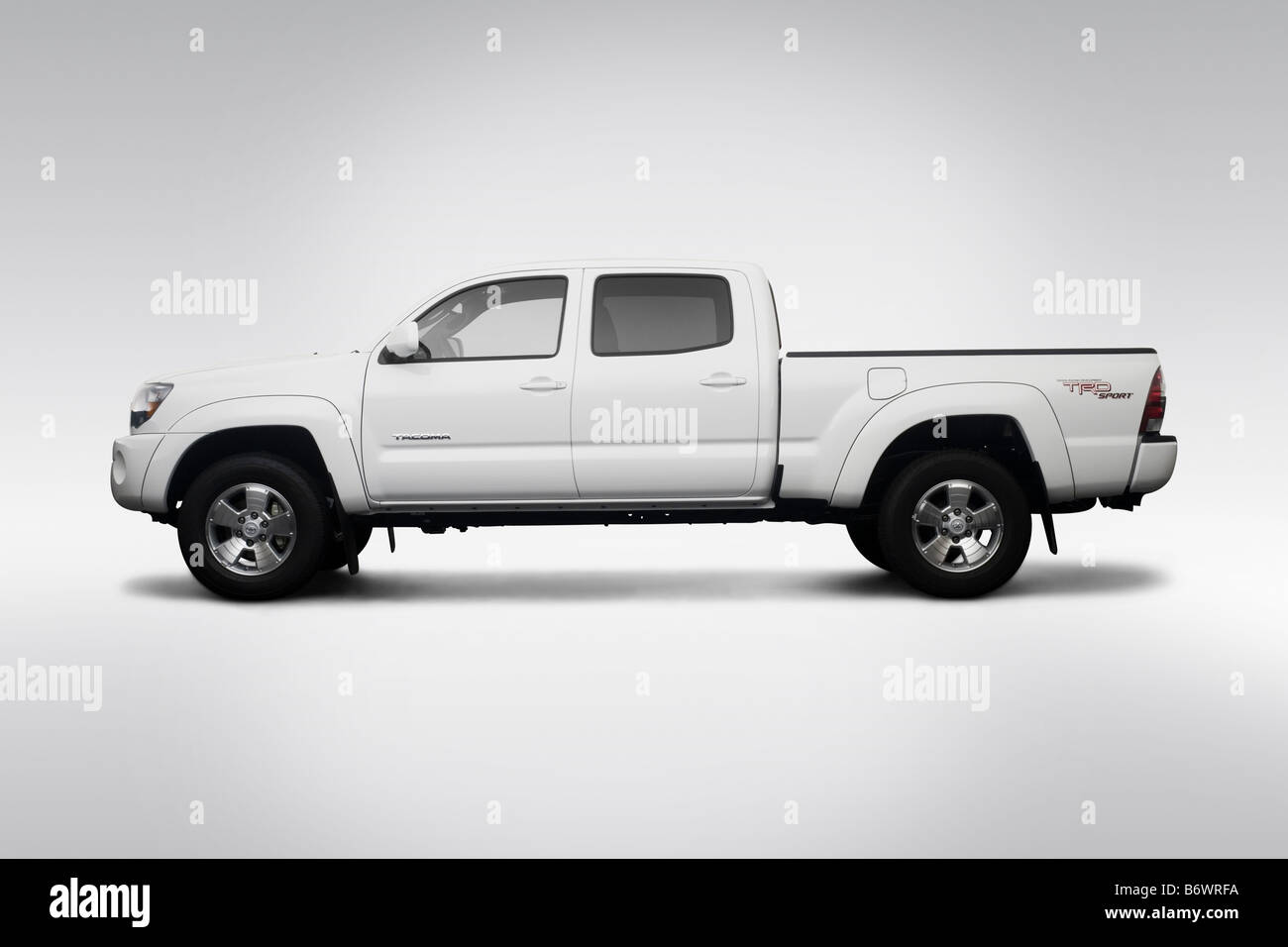 2009 Toyota Tacoma PreRunner in White - Drivers Side Profile Stock ...