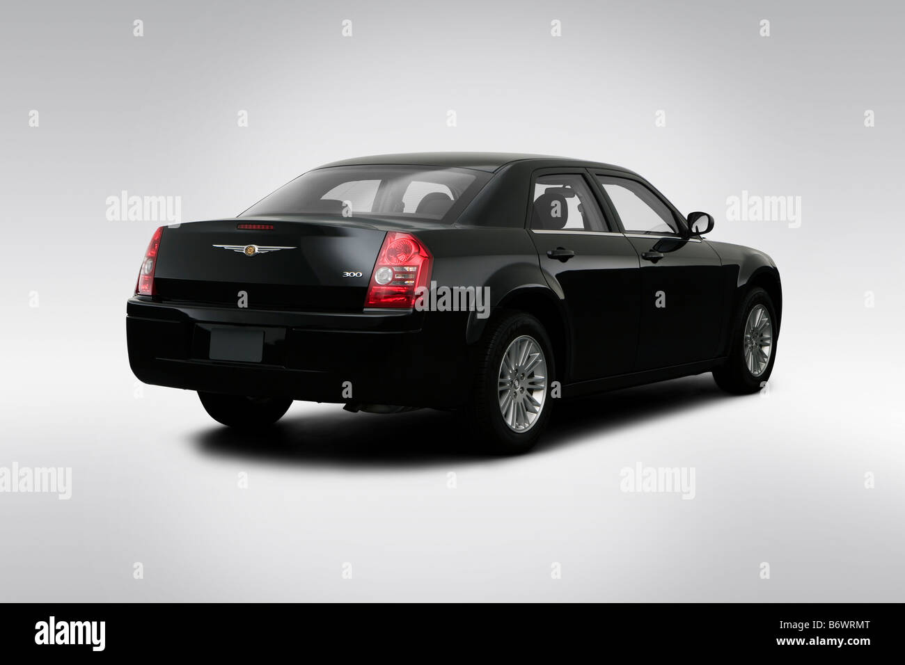 2009 Chrysler 300 LX in Black - Rear angle view Stock Photo - Alamy