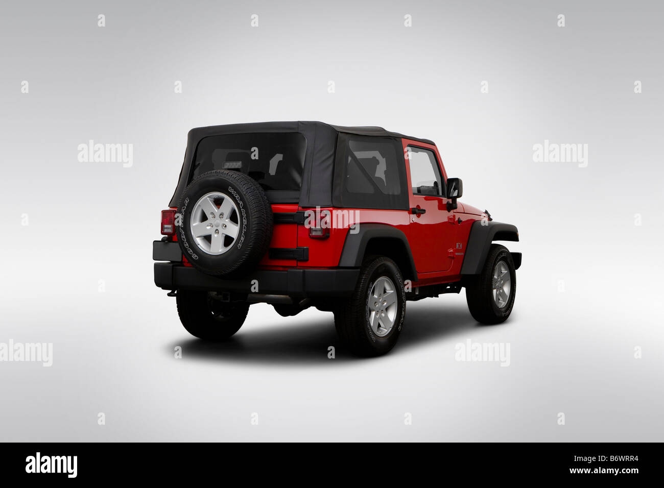 2009 Jeep Wrangler X in Red - Rear angle view Stock Photo - Alamy
