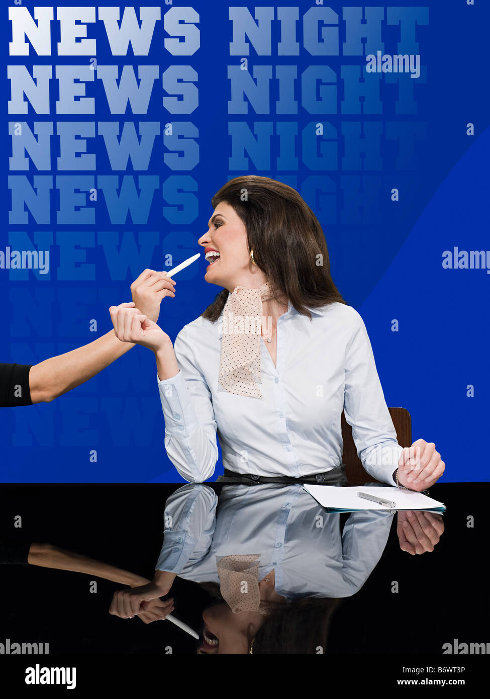 News presenter in make up Stock Photo - Alamy
