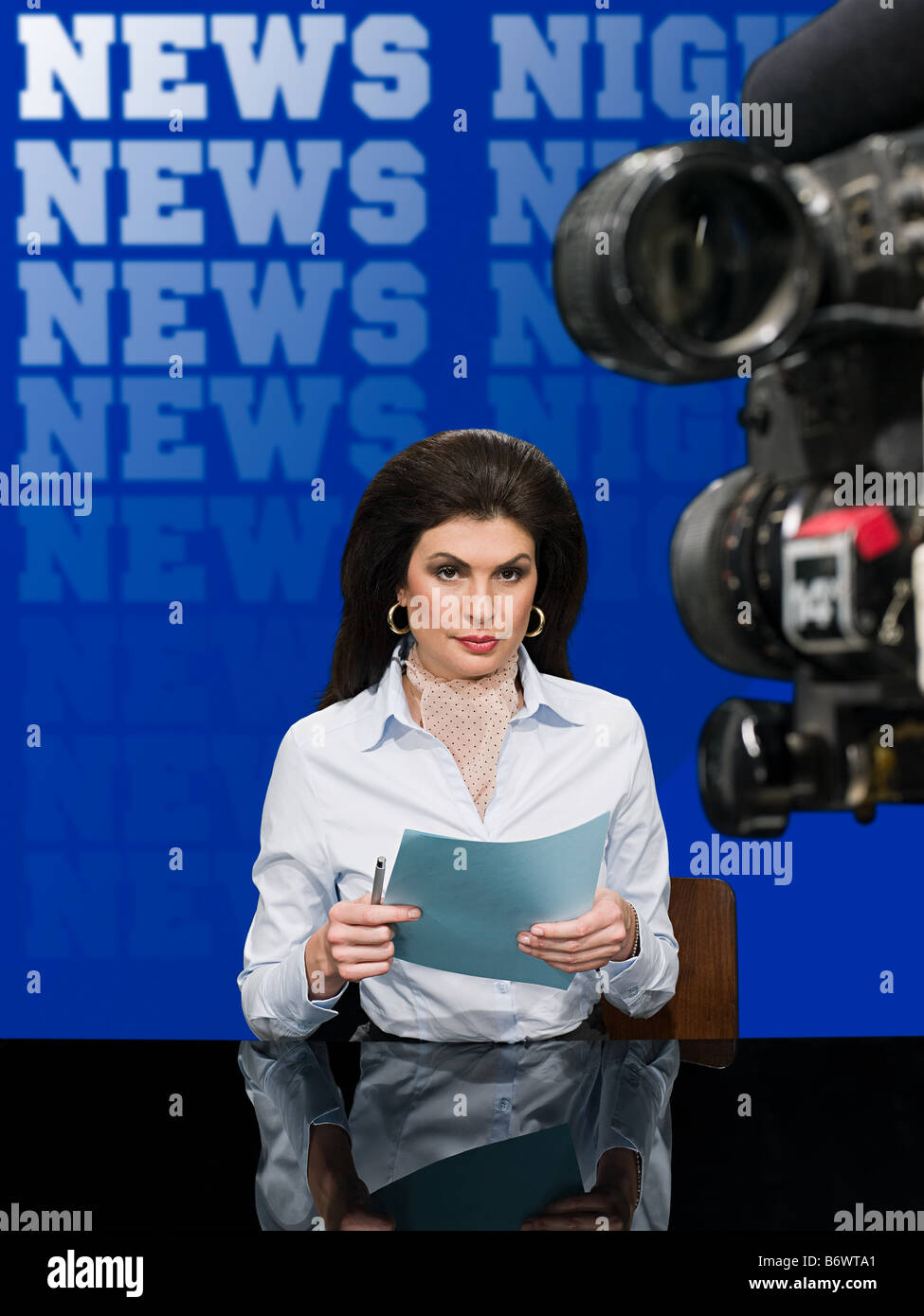 News presenter and camera Stock Photo - Alamy