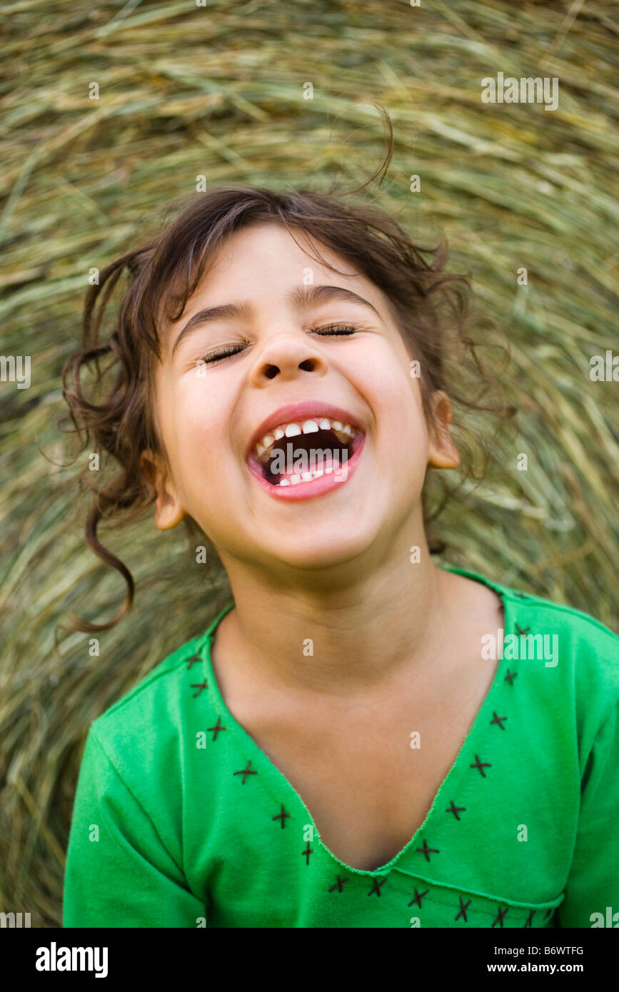 Portrait of a girl laughing Stock Photo - Alamy