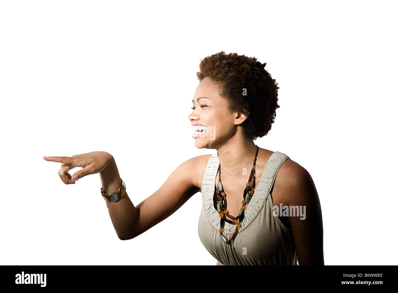 Young woman pointing Stock Photo - Alamy