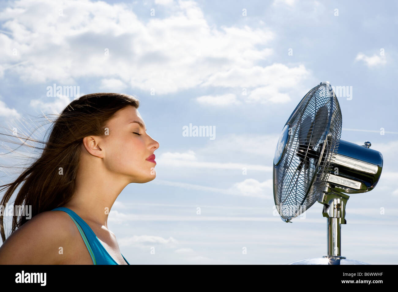 Woman electric fan caucasian hi-res stock photography and images - Alamy