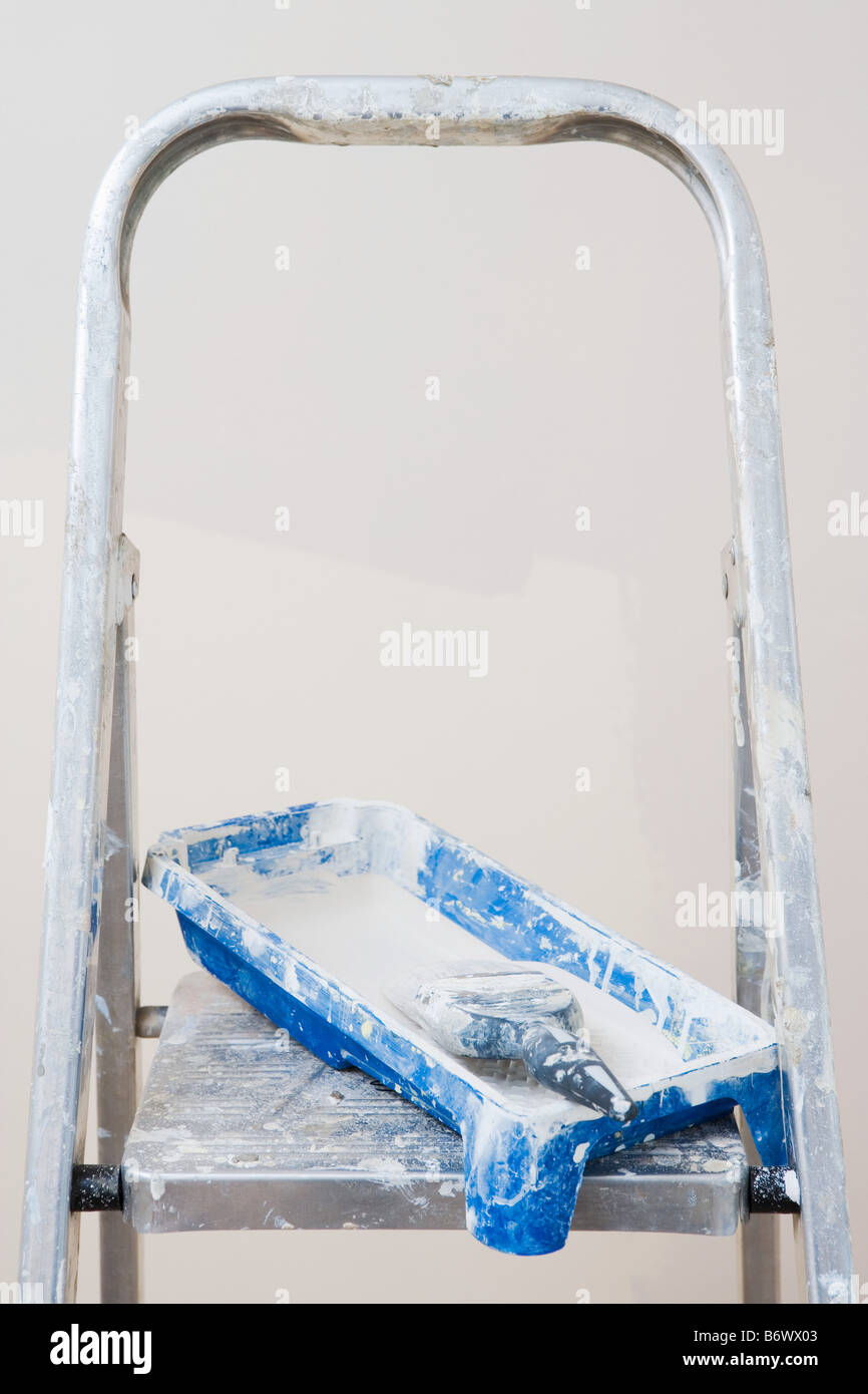 Ladder and a tray of paint Stock Photo - Alamy