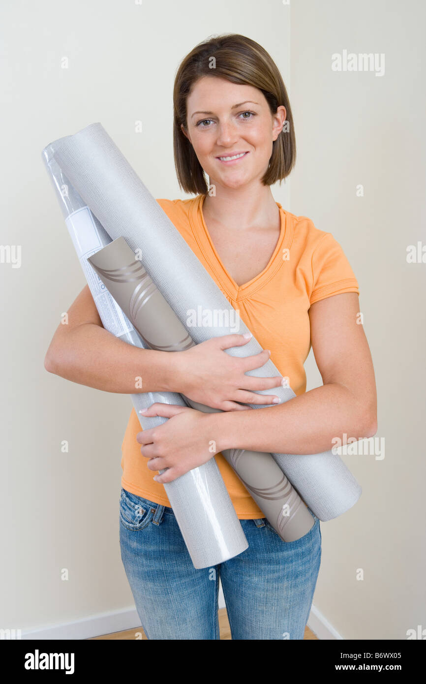 Young decorator roll wallpaper hi-res stock photography and images - Alamy