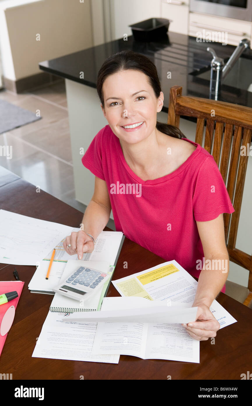Woman with paperwork Stock Photo - Alamy