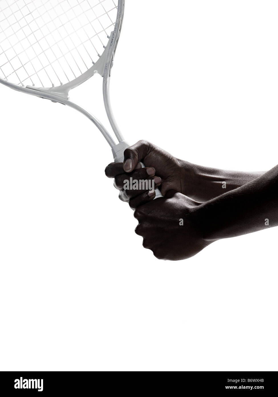 A woman holding a tennis racket Stock Photo - Alamy
